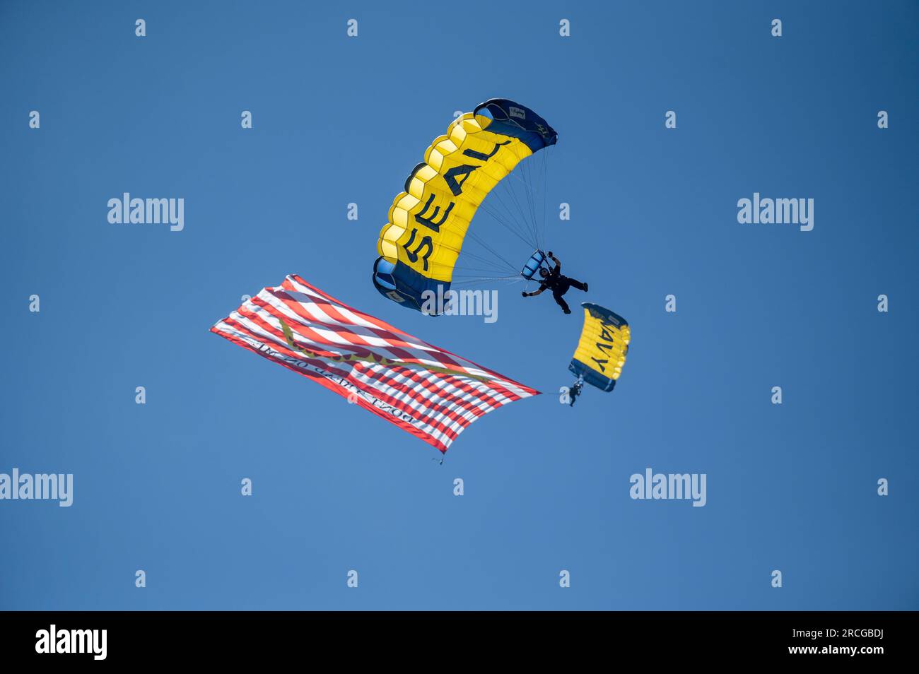 The Navy parachute team, the “Leap Frogs,’ perform a demonstration at ...