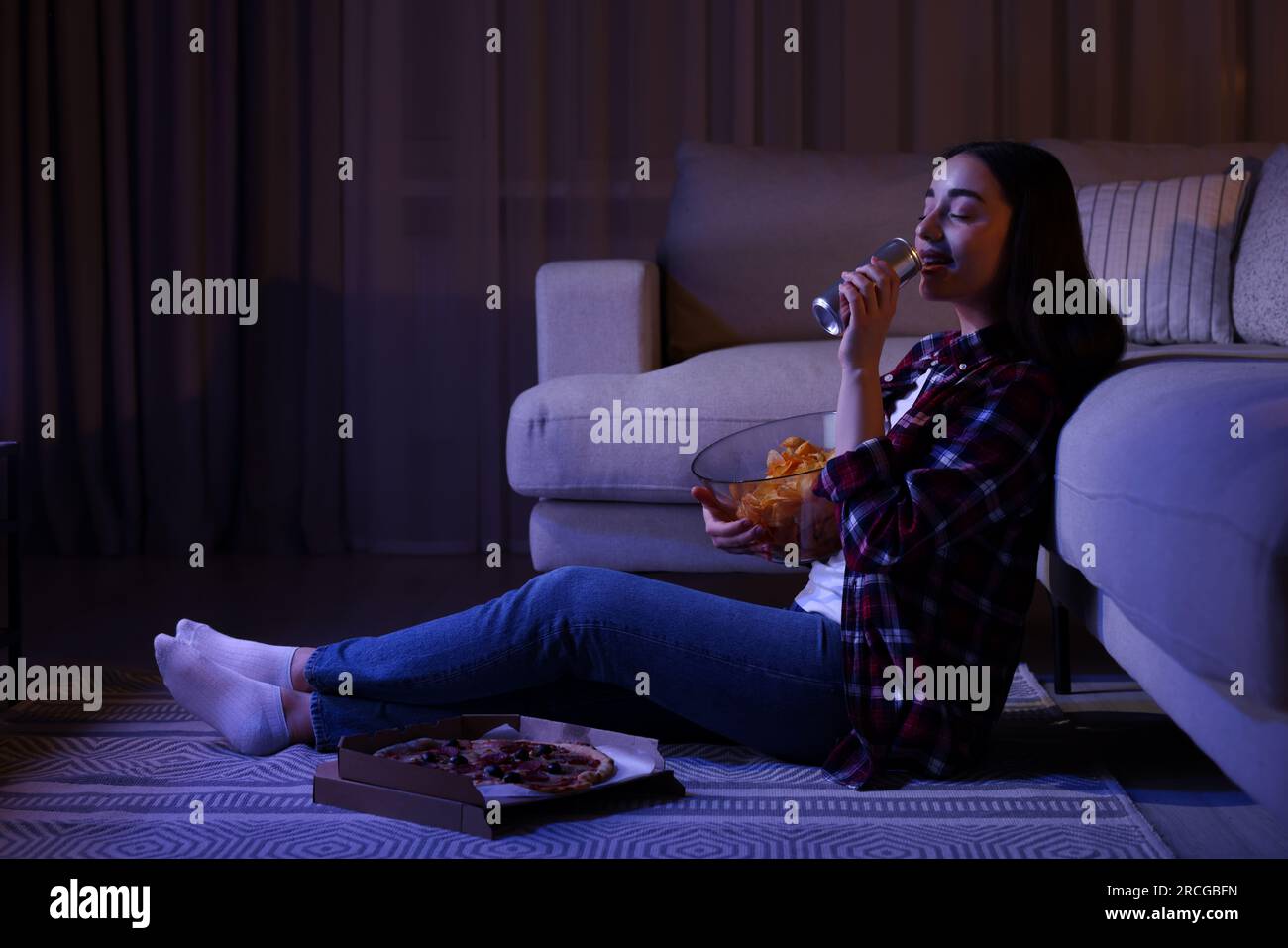 Woman Watching Tv At Night
