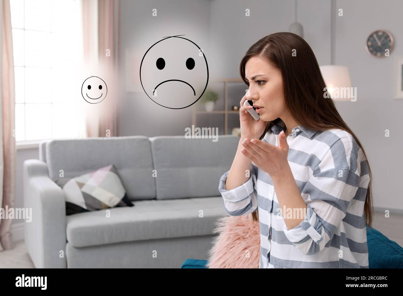 Dissatisfied woman giving negative feedback by phone at home ...