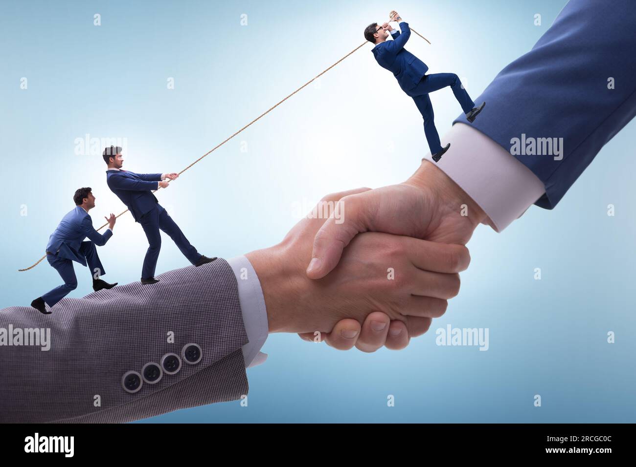Concept of the teamwork and mutual support Stock Photo - Alamy