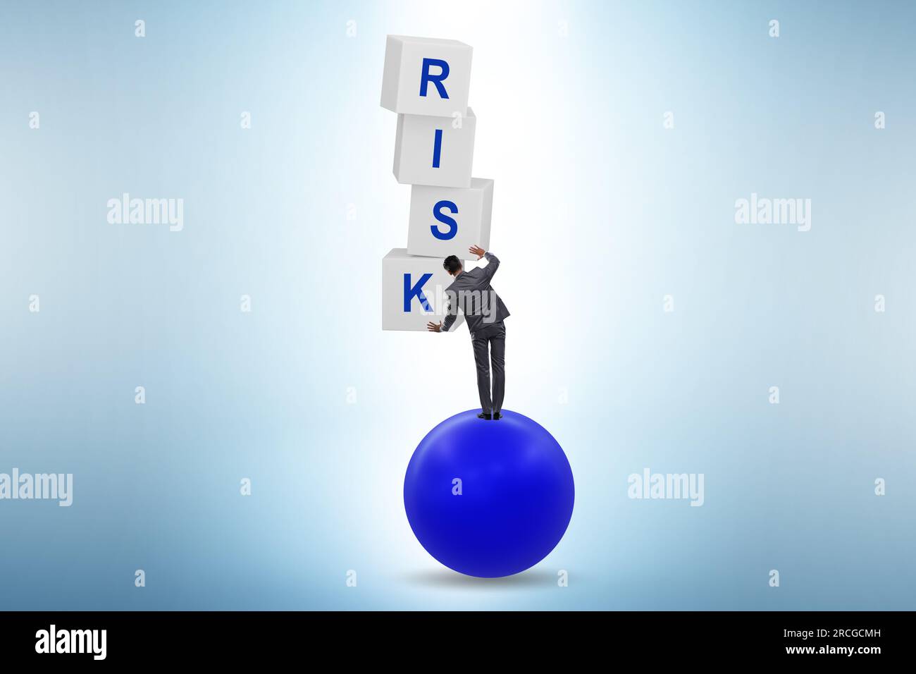 Risk management concept with the balancing businessman Stock Photo - Alamy