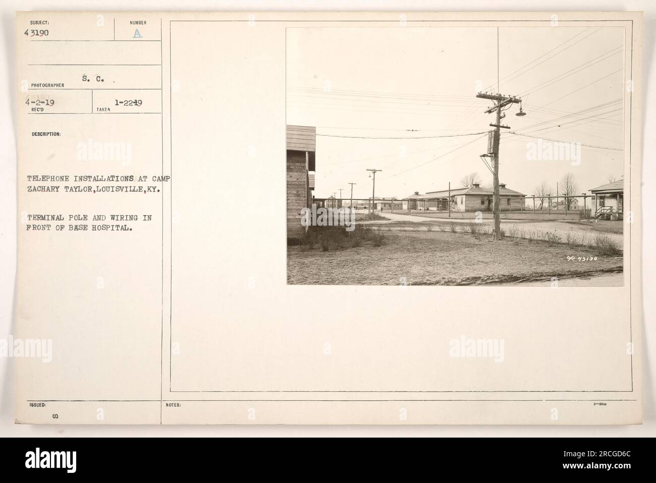 This photograph shows a view of the telephone installations at Camp ...