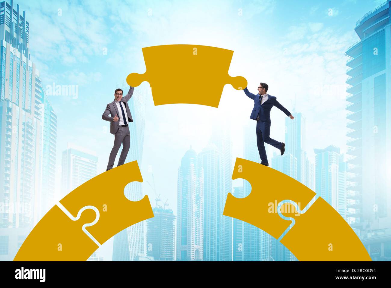 Business people building bridge in the teamwork concept Stock Photo - Alamy