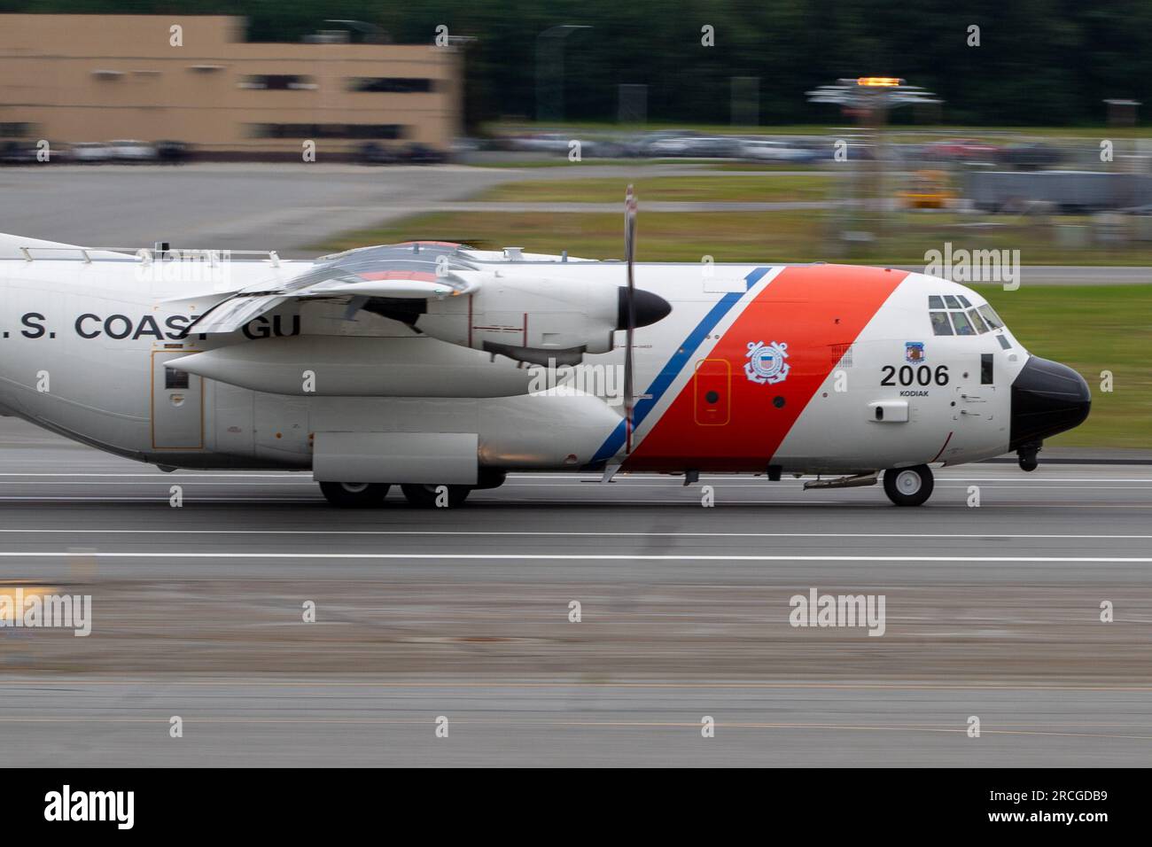 A U.S. Coast Guard HC-130 Hercules lands at Joint Base Elmendorf ...