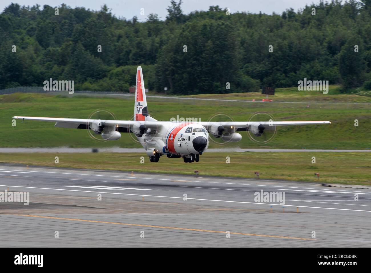 A U.S. Coast Guard HC-130 Hercules lands at Joint Base Elmendorf ...