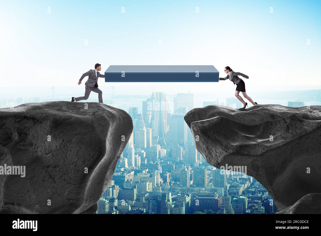 Concept of teamwork with the bridge being built Stock Photo - Alamy