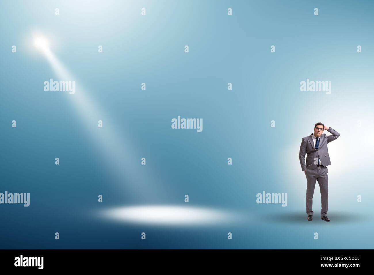 Business people under the spotlight concept Stock Photo - Alamy