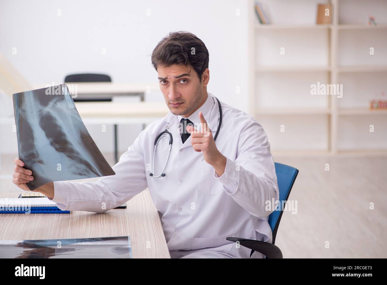 Young doctor radiologist working at the hospital Stock Photo - Alamy