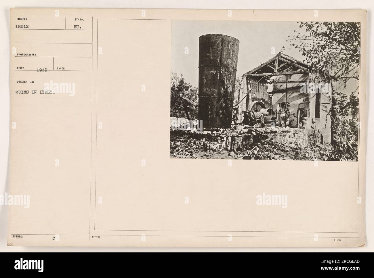 "The photograph (111-SC-18012) captures the aftermath of destruction in ...