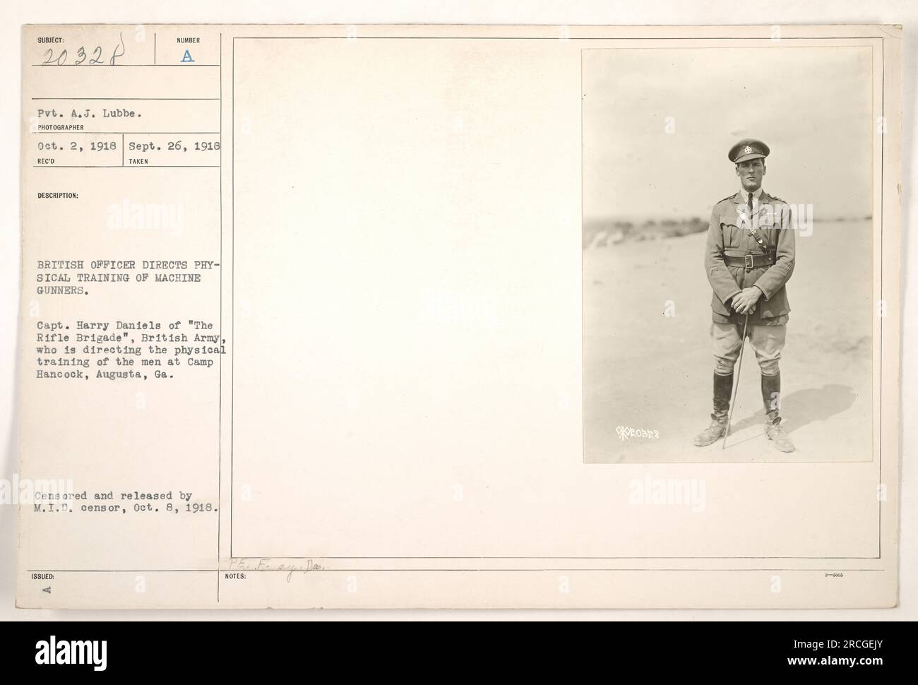Capt. Harry Daniels of "The Rifle Brigade", British Army, directing the ...