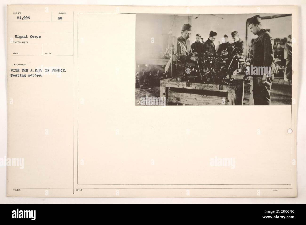 Image shows American soldiers in France testing motors during World War ...