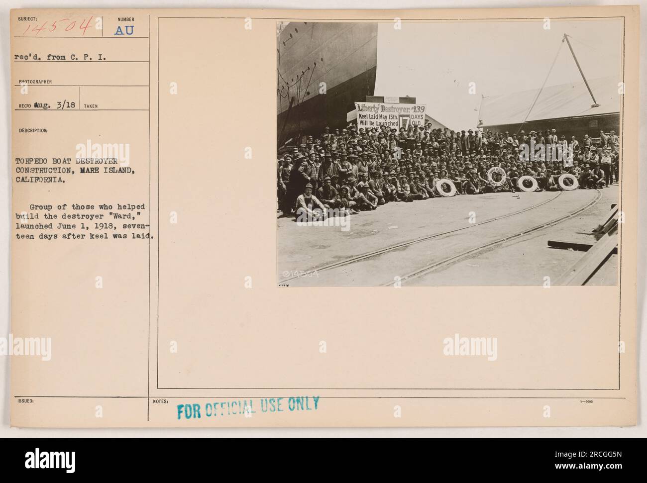 Group of workers who assisted in the construction of the USS Ward, a ...