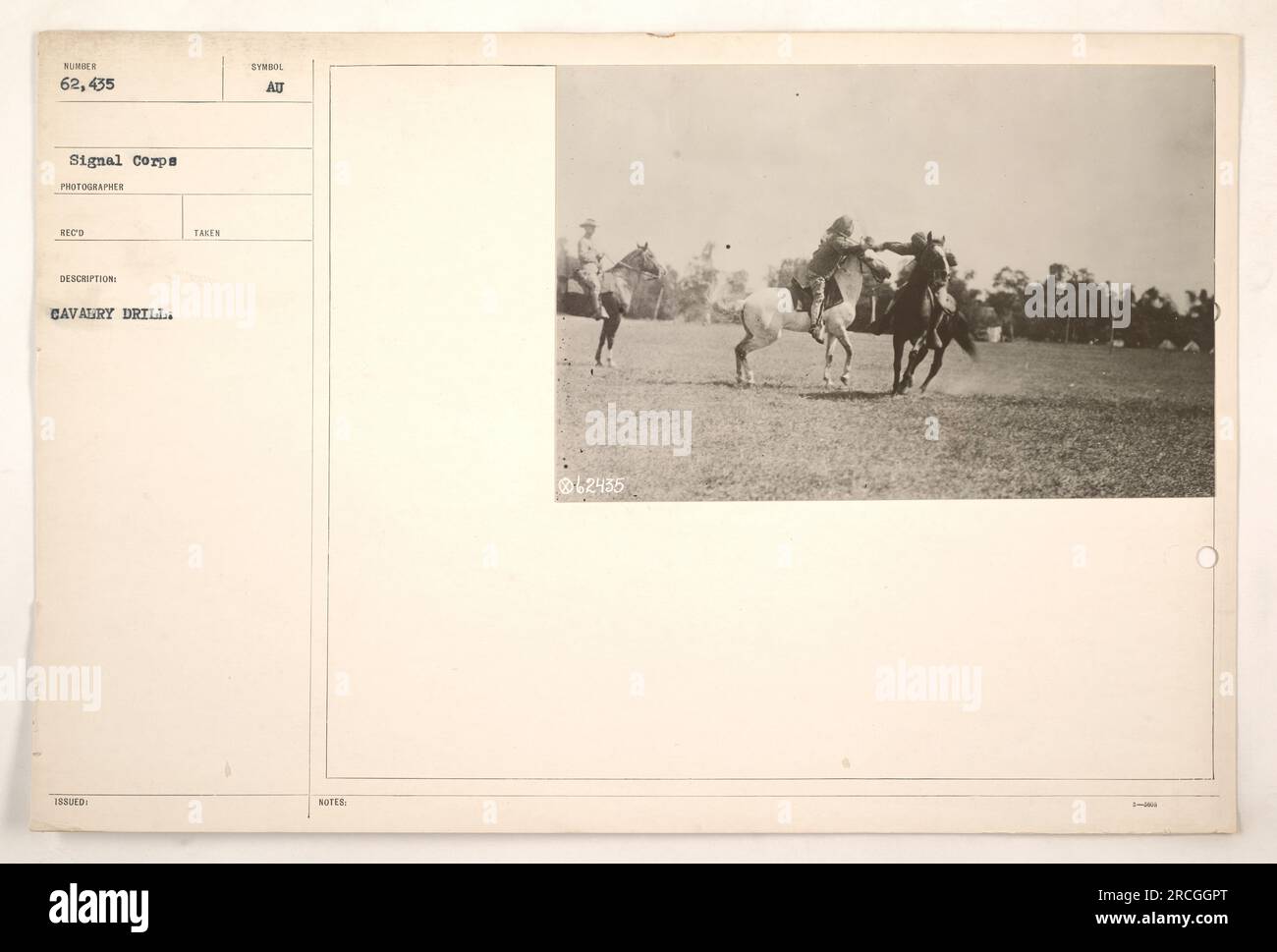 A photograph capturing a cavalry drill during World War One. The image was captured by a ...