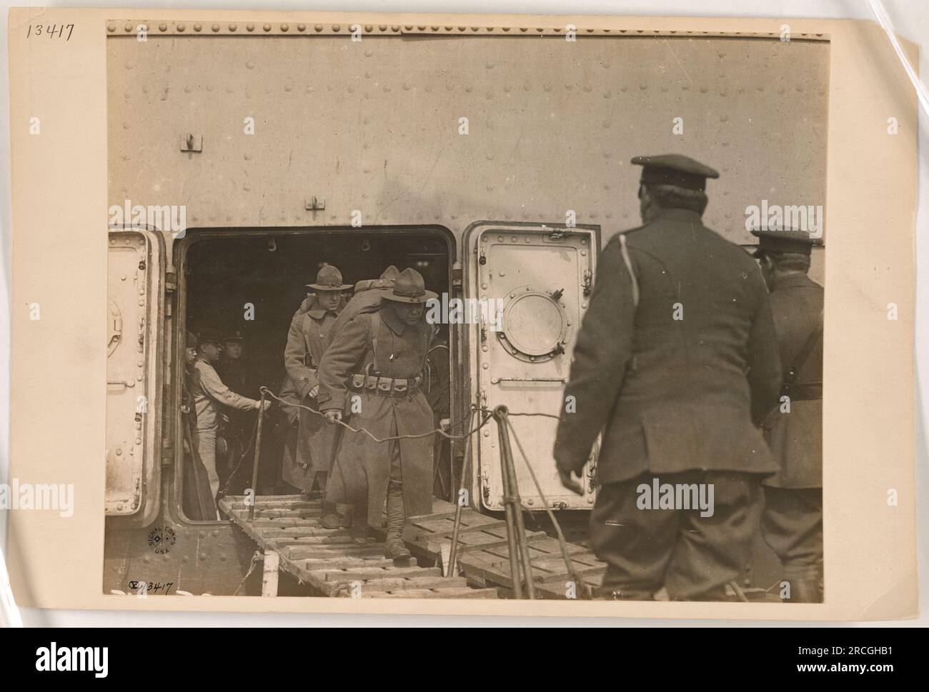 Soldiers from the American military march in formation during World War ...