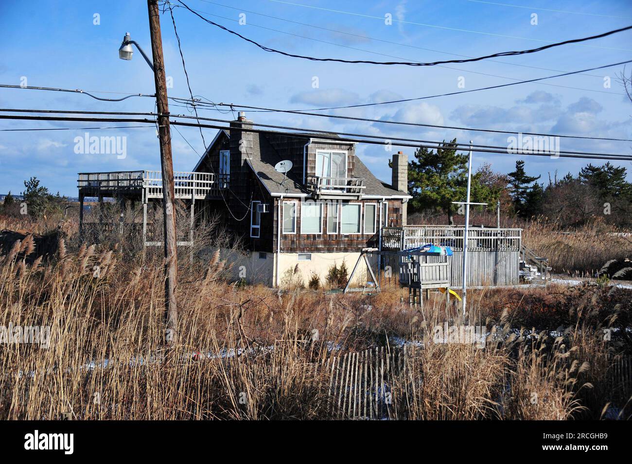 NEW YORK - FEBRUARY 09: Joe Brewer's house(FAR LEFT) in the Oak Beach ...