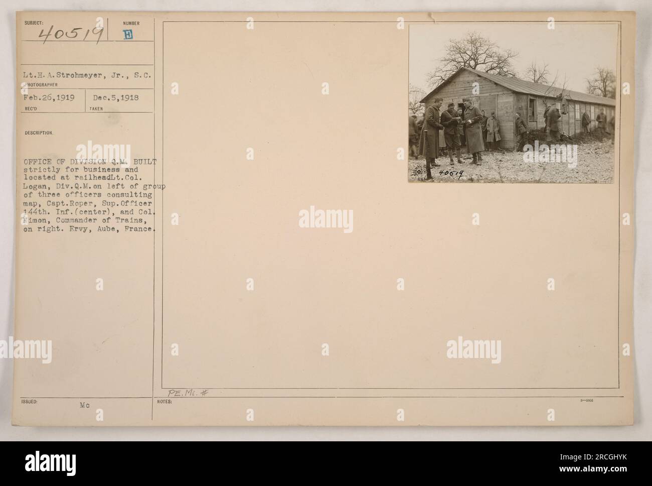 Lt. Col. Logan, Division Q.M., is seen on the left, along with Capt ...