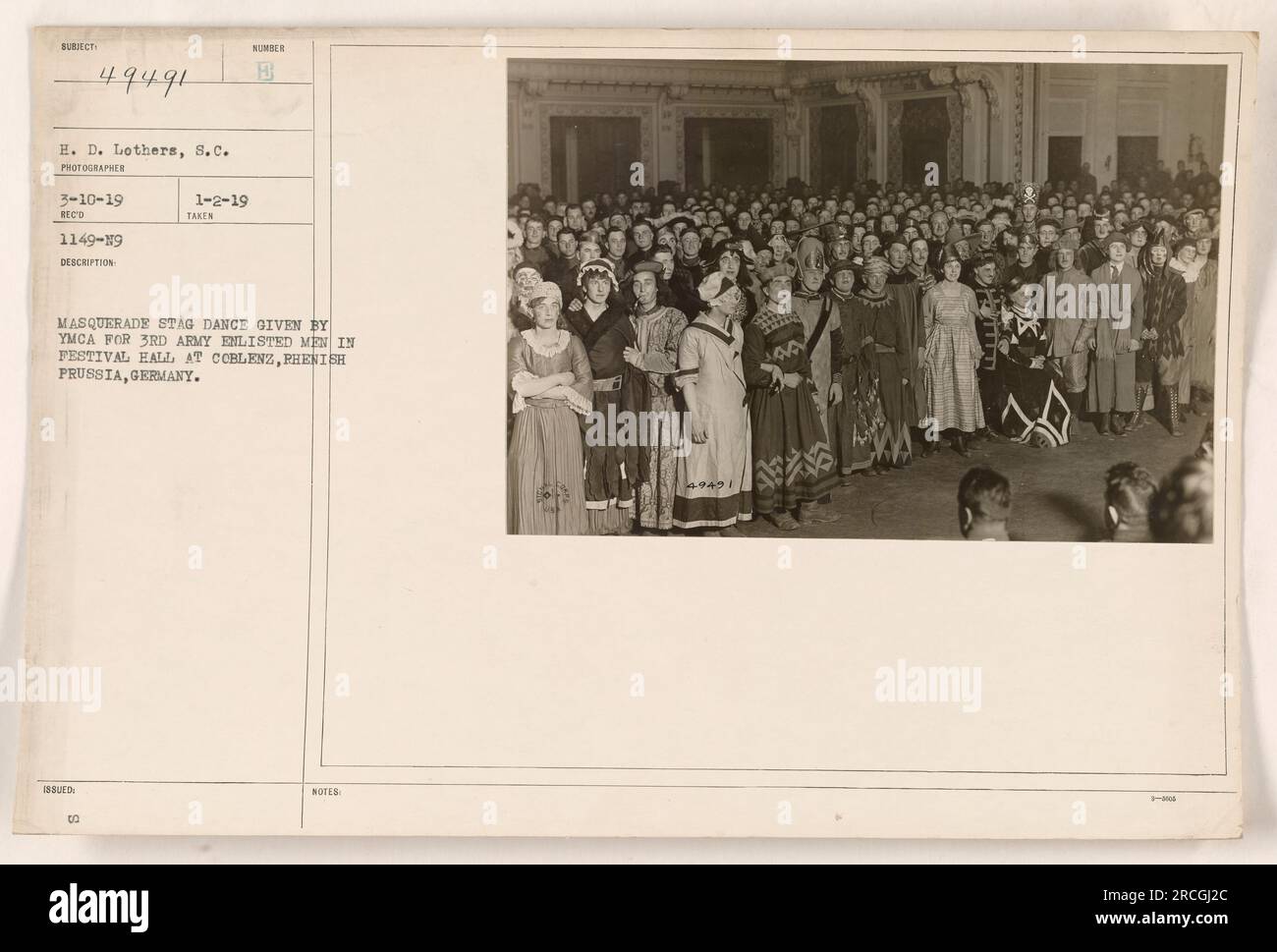 Masquerade stag dance organized by the YMCA for enlisted men of the 3rd ...