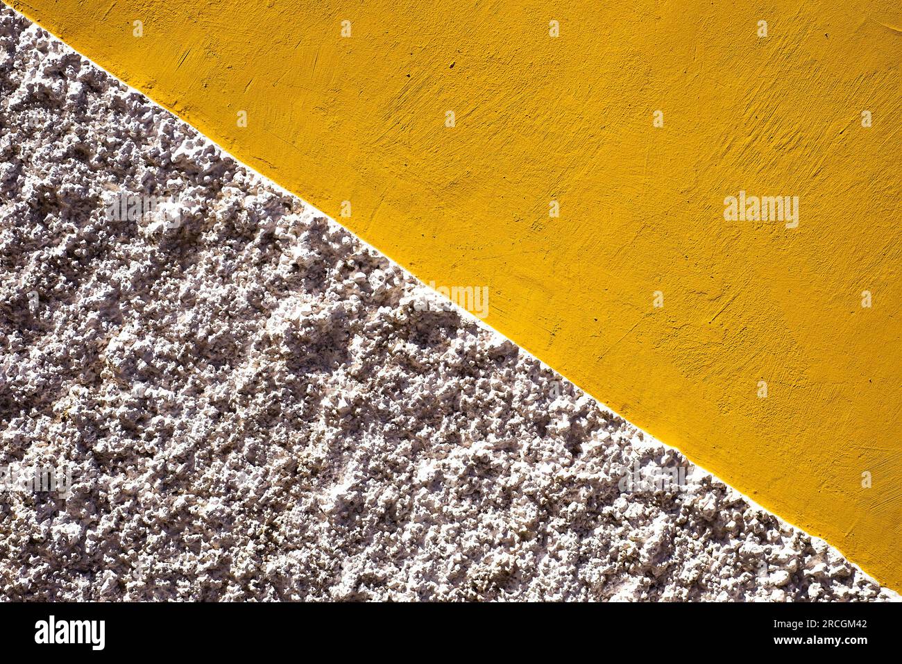 Elegant diagonal split surface with rough white and saturated yellow ...