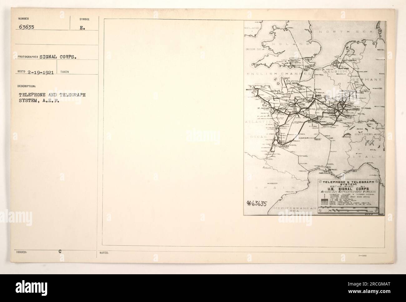 Image shows American soldiers at work setting up a telephone and ...
