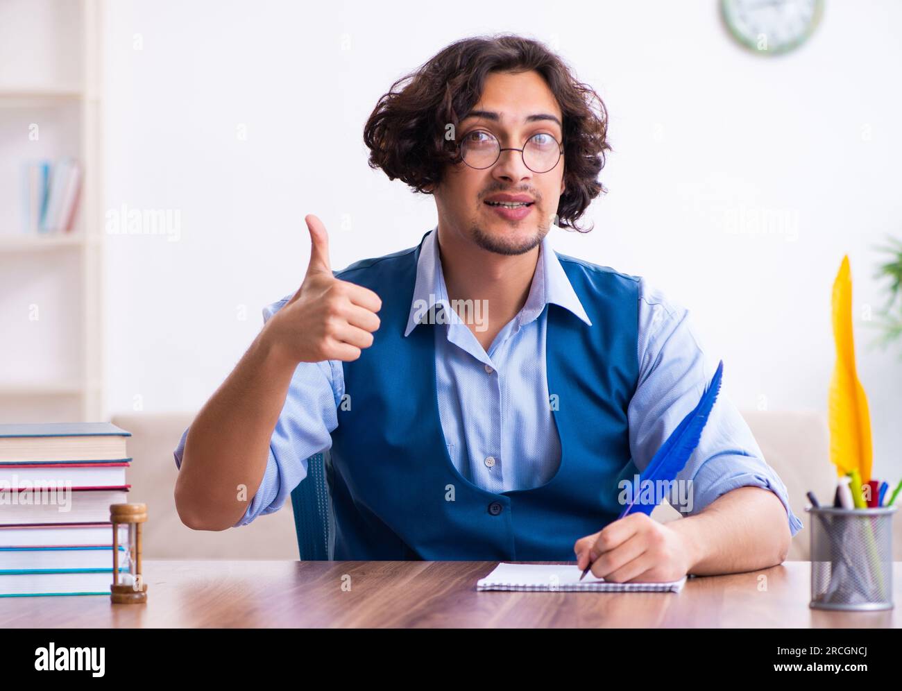 The young writer working on his new work Stock Photo - Alamy