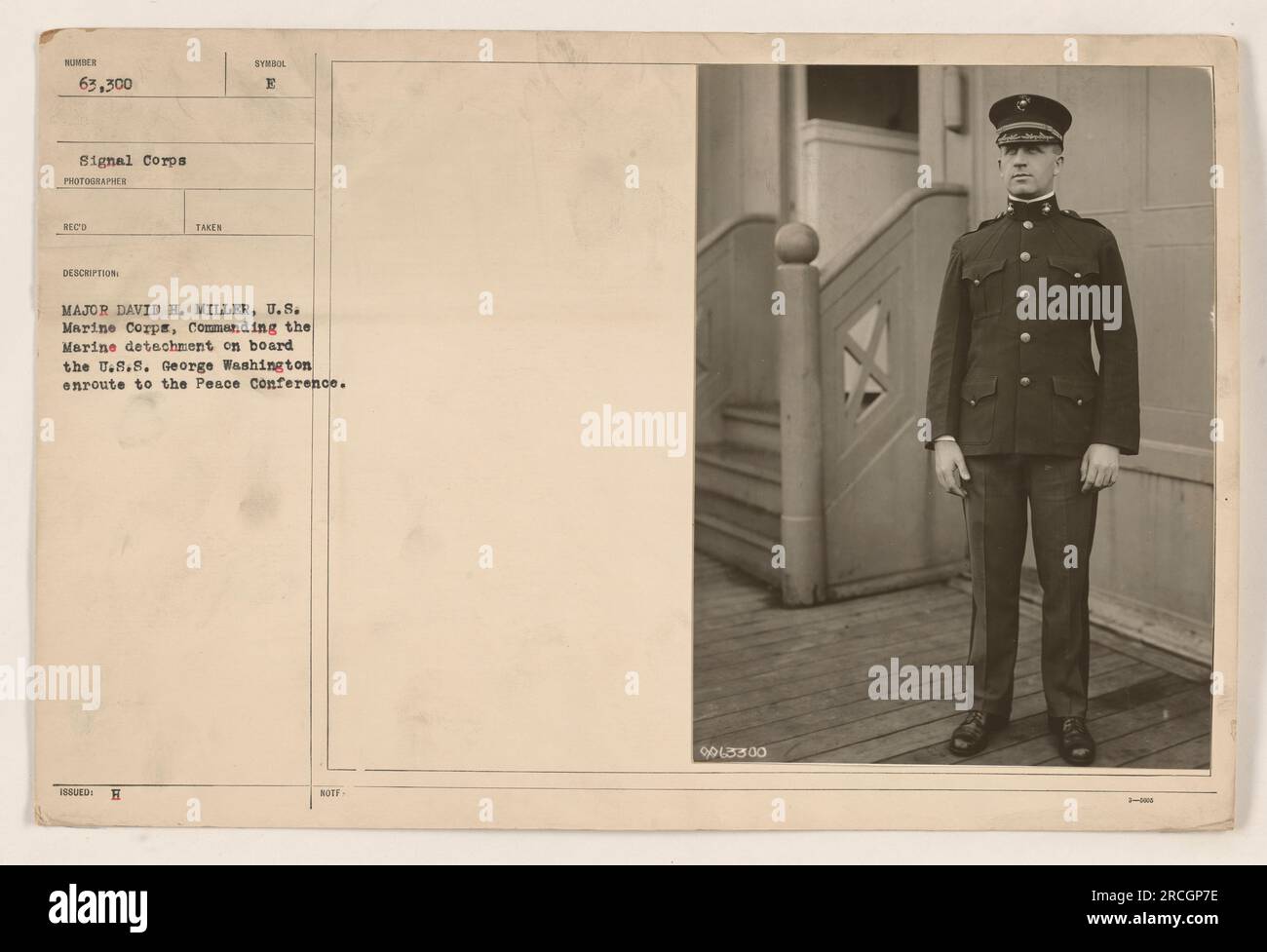 Major David H. Miller, a U.S. Marine Corps officer, is seen commanding ...