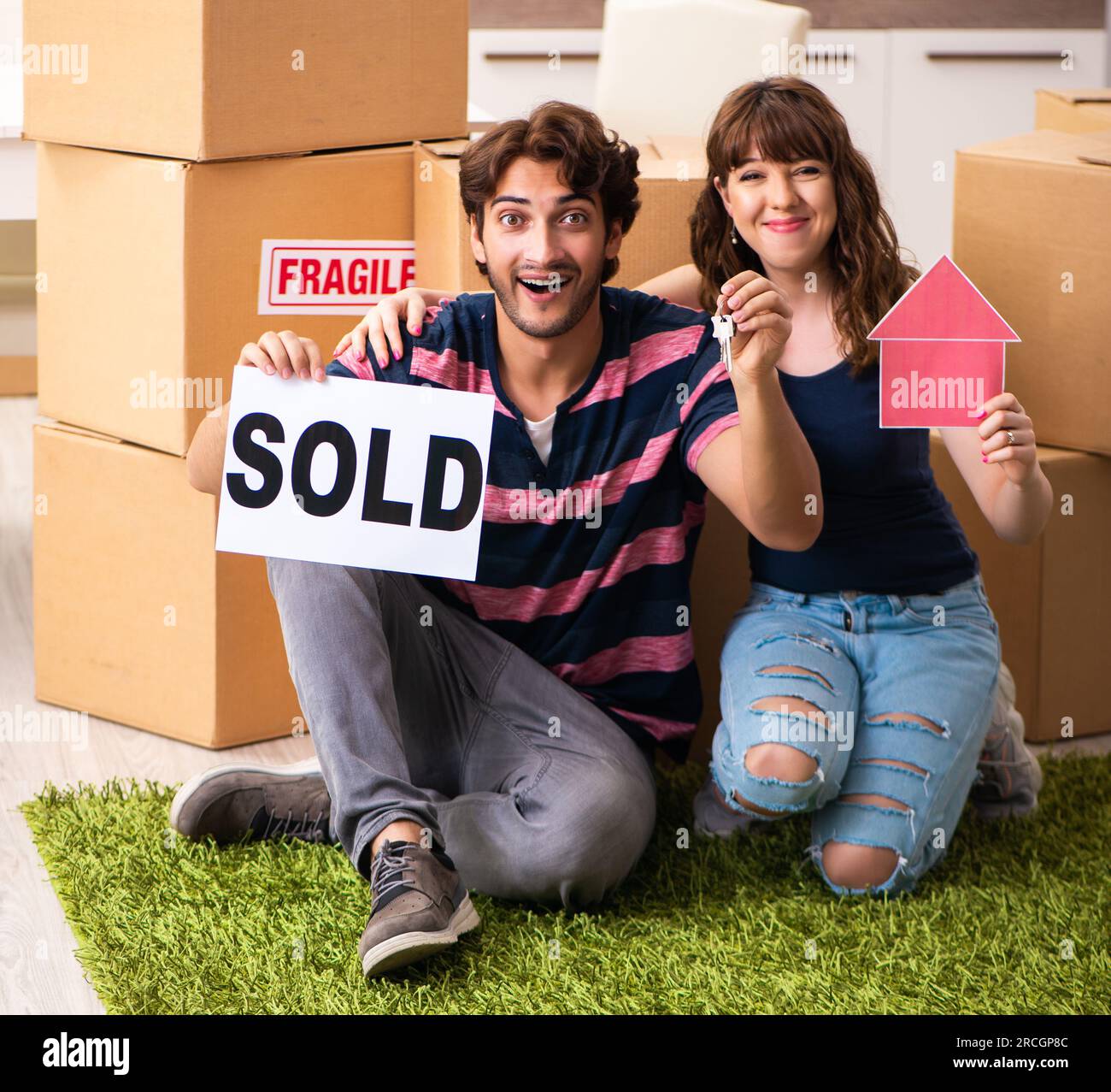 The young family selling their house Stock Photo - Alamy