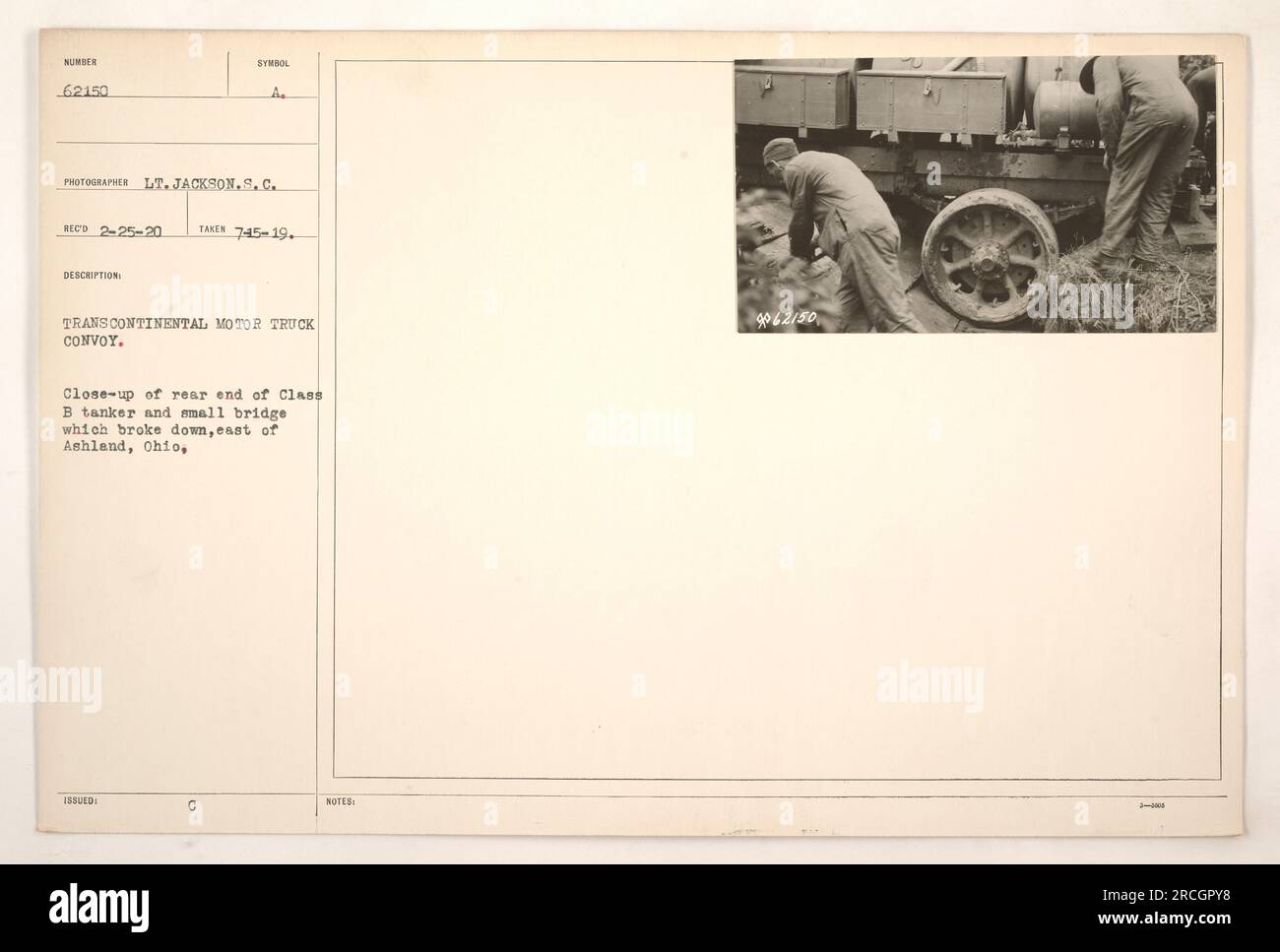 A close-up photograph of the rear end of a Class B tanker and a small ...