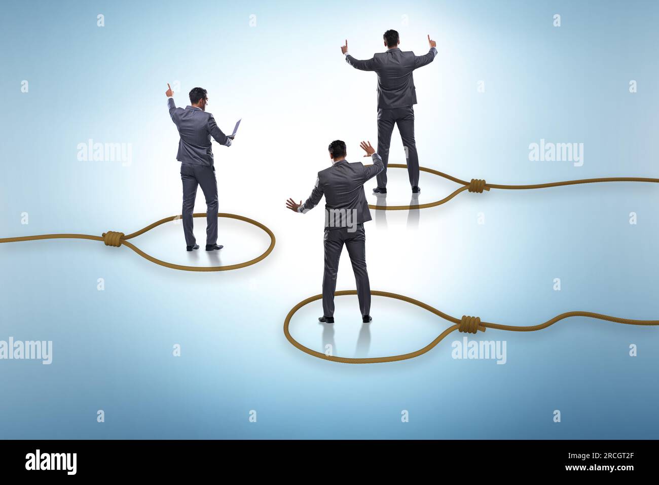 Business people trapped by the rope Stock Photo - Alamy