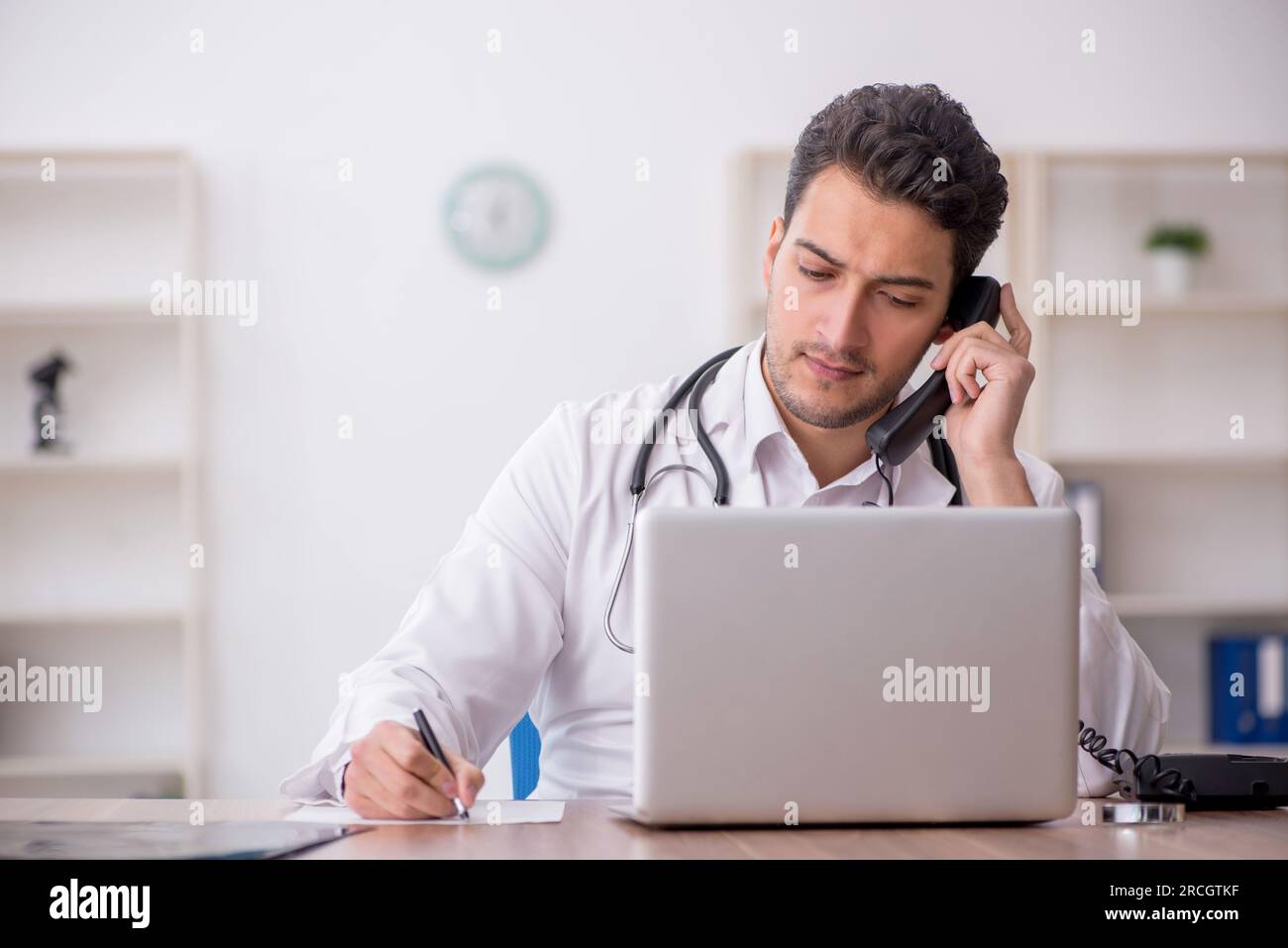 Doctor taking notes telehealth hi-res stock photography and images - Alamy