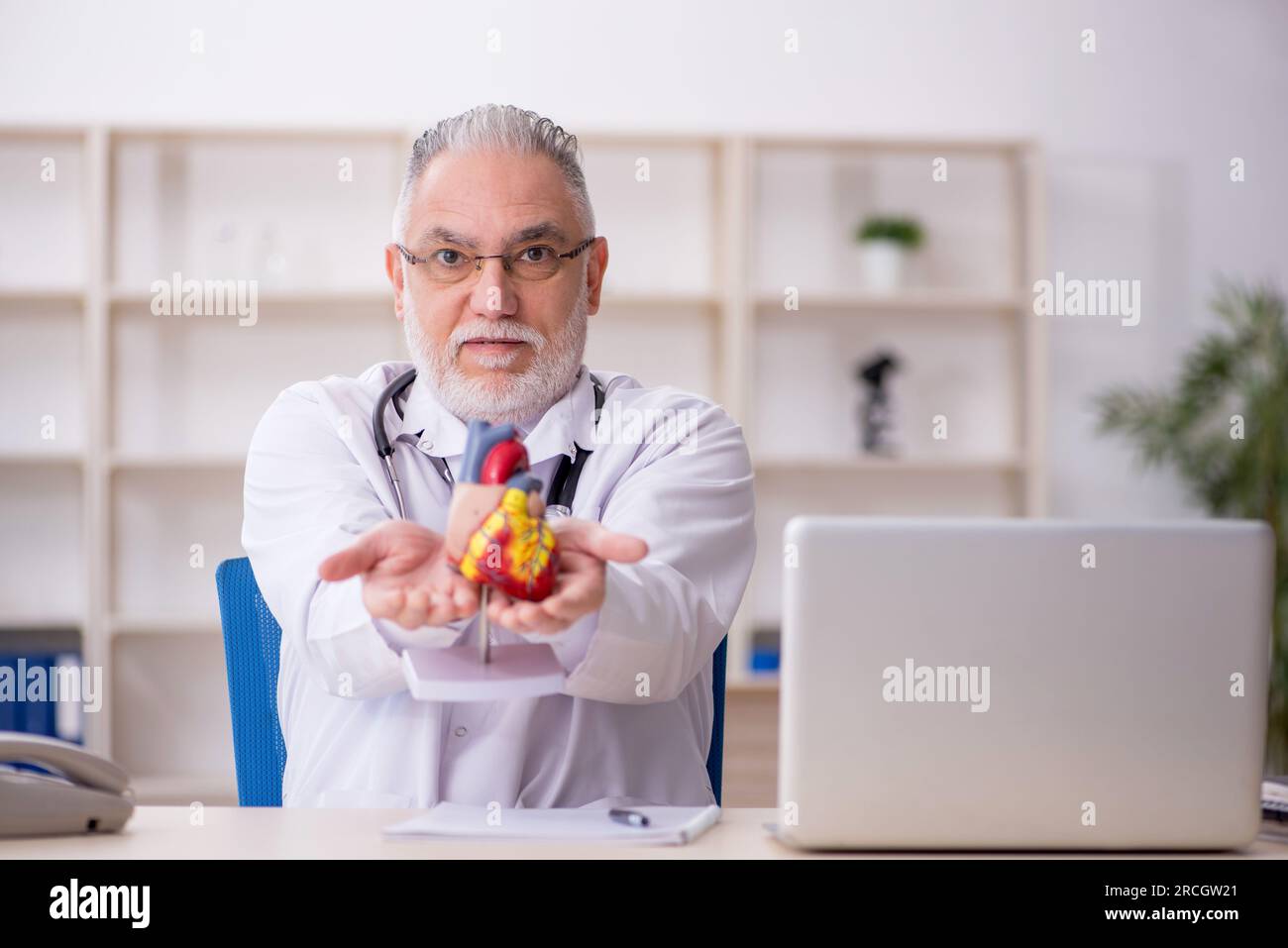 Doctor showing cardiogram old hi-res stock photography and images - Alamy