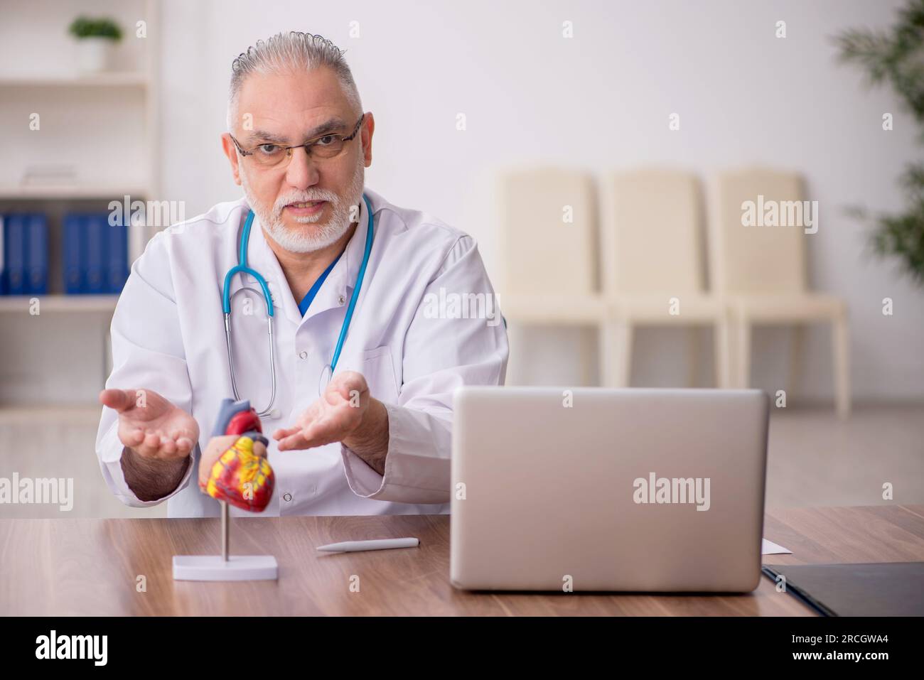 Doctor showing cardiogram old hi-res stock photography and images - Alamy
