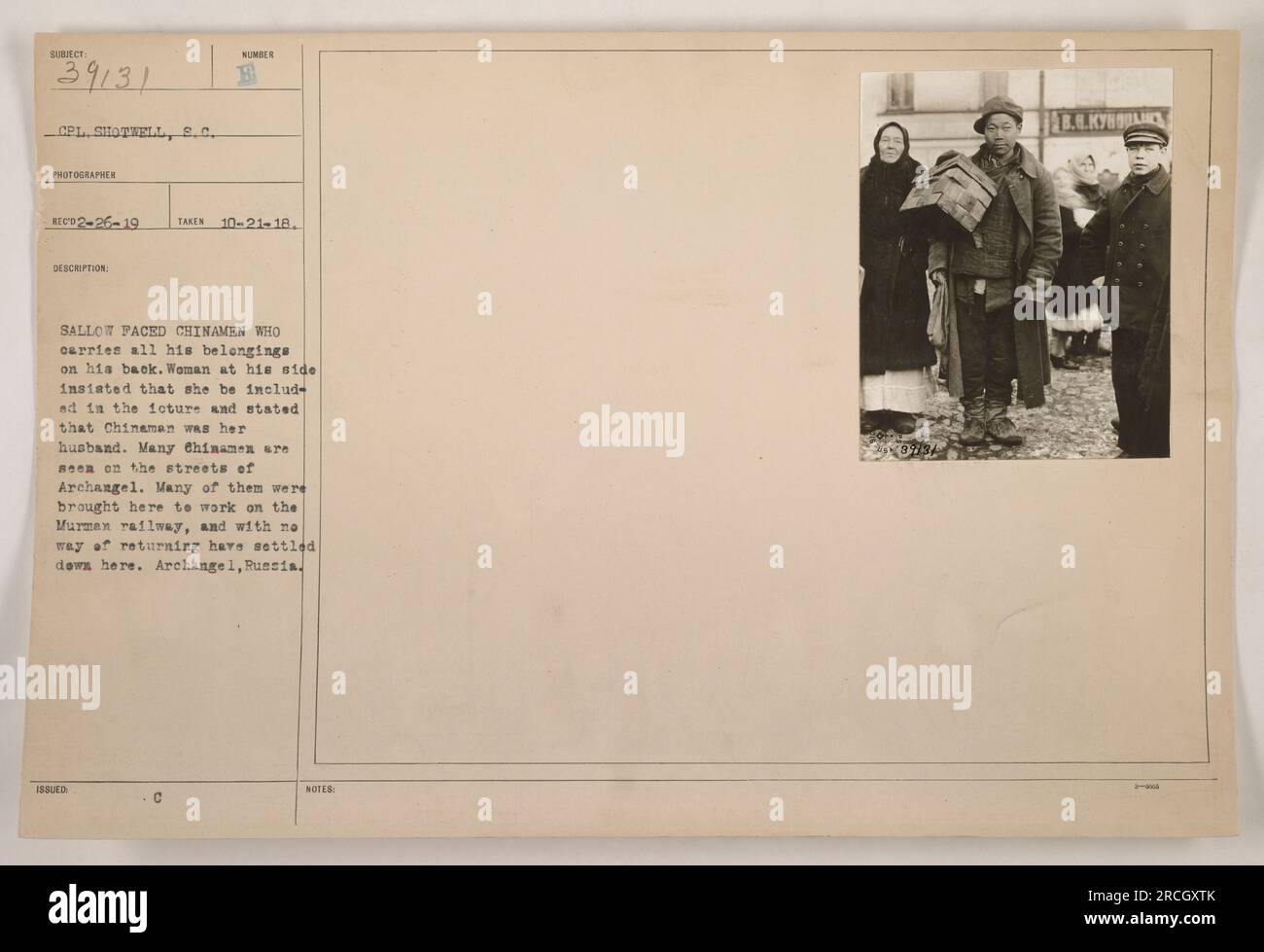 A Chinese laborer carrying his belongings on his back, with his Russian ...