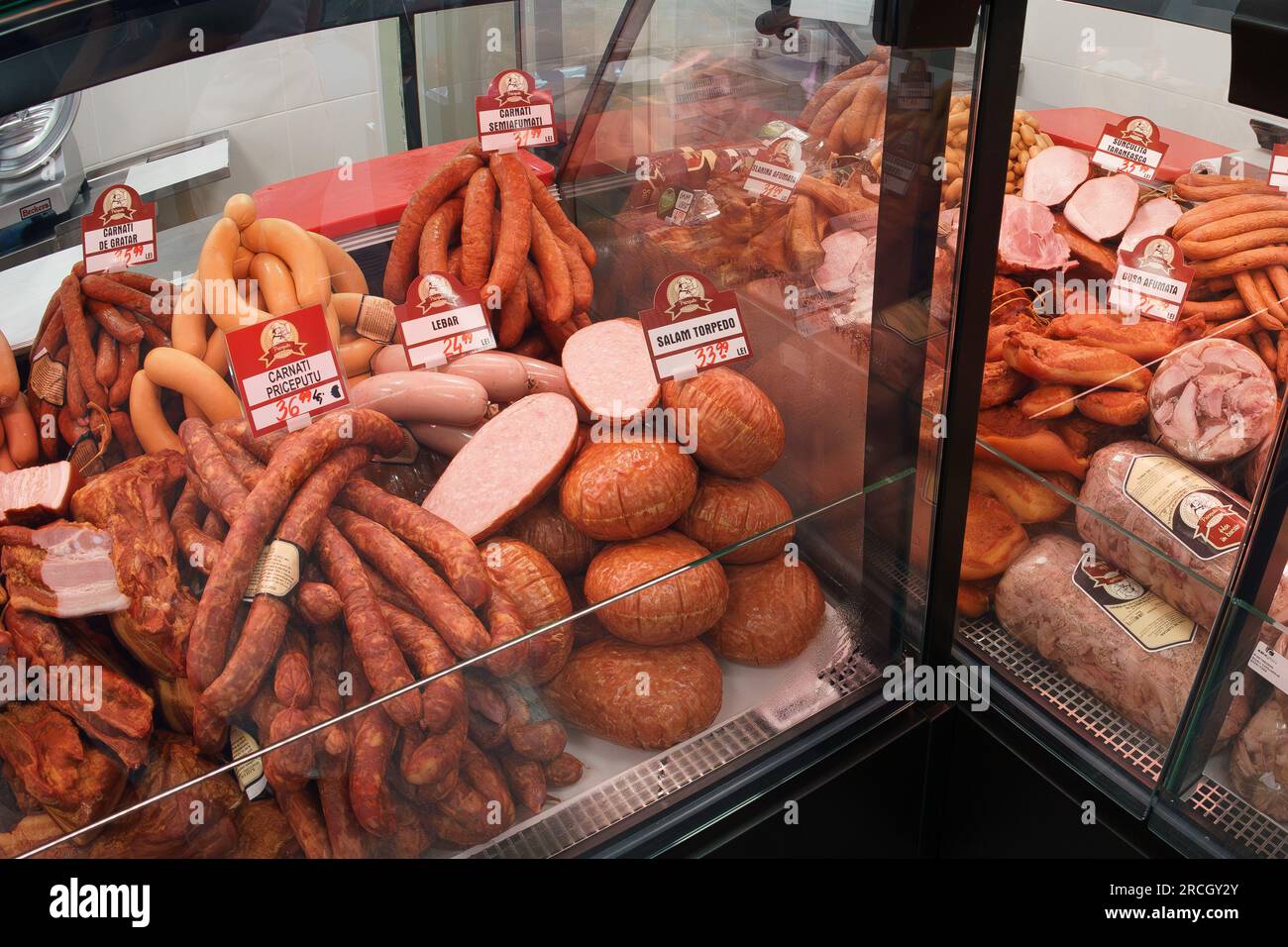 Bucharest, Romania. 14th July, 2023: A display fridge with sausages and ...