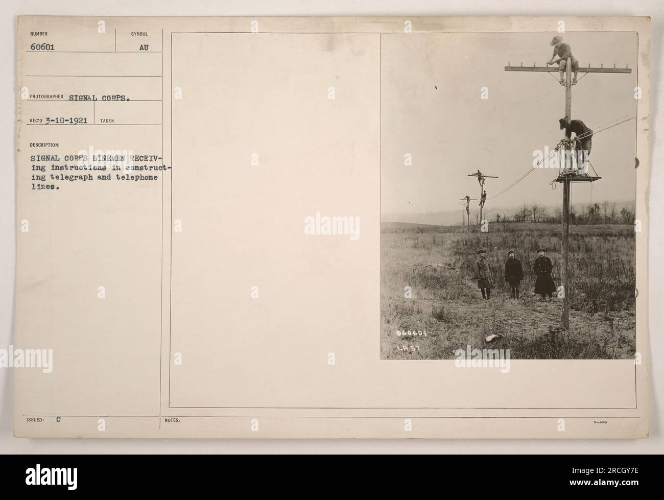 Signal Corps linemen receiving instructions in constructing telegraph ...