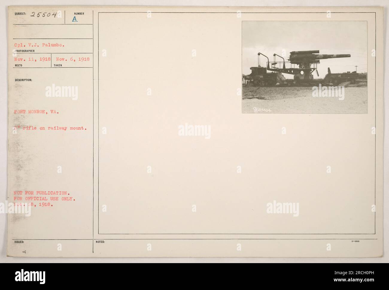 Cpl. V.J. Palumbo at Fort Monroe, VA, poses with a rifle on a railway ...