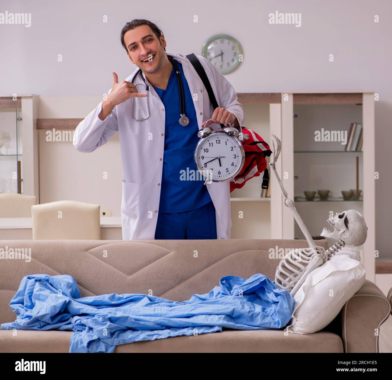 Male paramedic visiting skeleton patient Stock Photo - Alamy