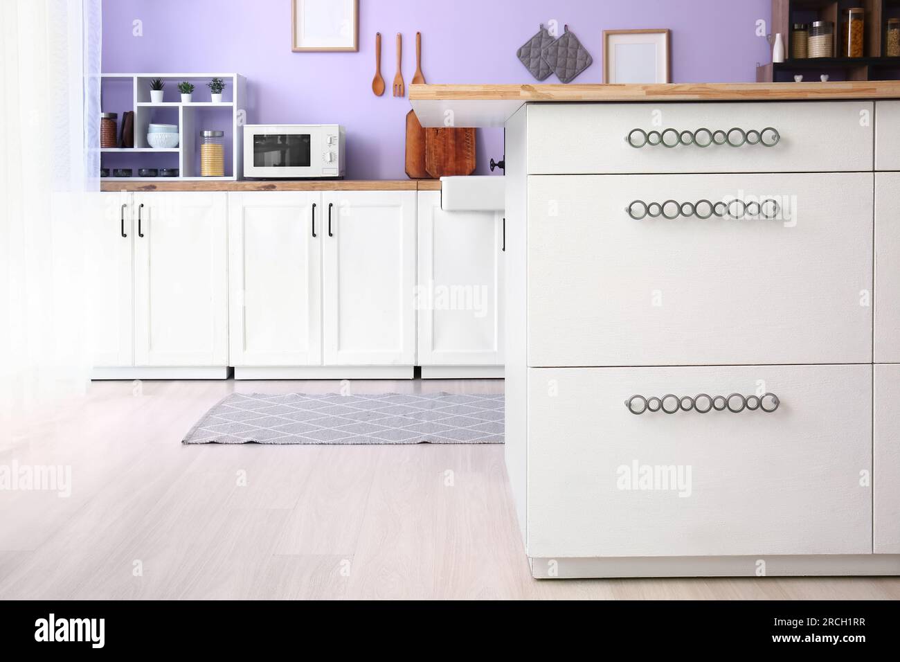 Interior of modern kitchen with drawer and white counters Stock Photo ...