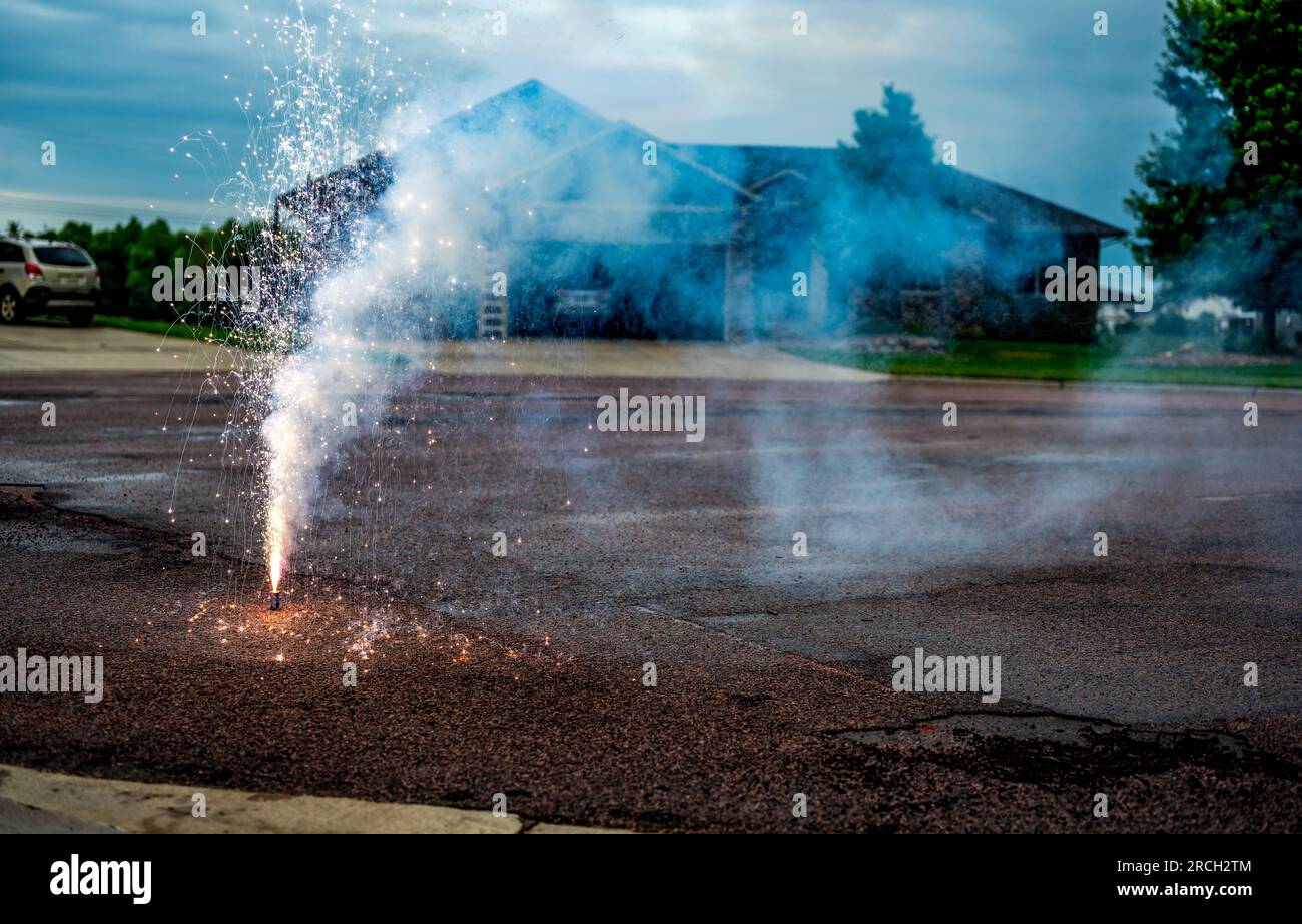 A fountain of sparks, flames, and smoke emitting from a fountain ...