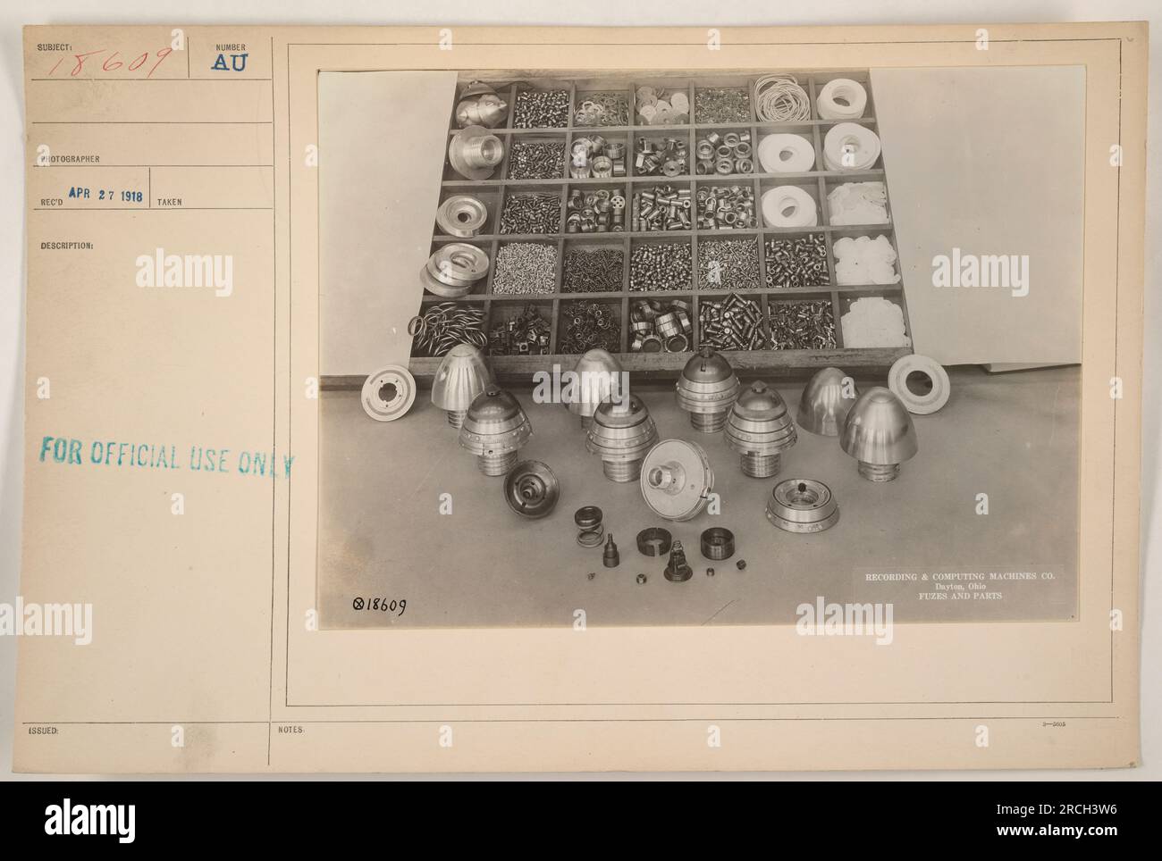 Soldiers working on recording and computing machines, fuzes, and parts ...