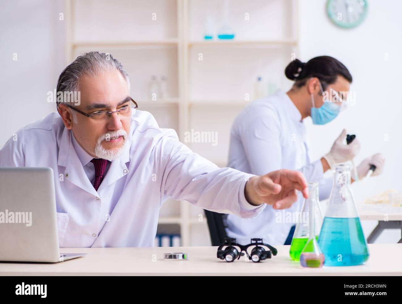 The two chemists working in the lab Stock Photo - Alamy