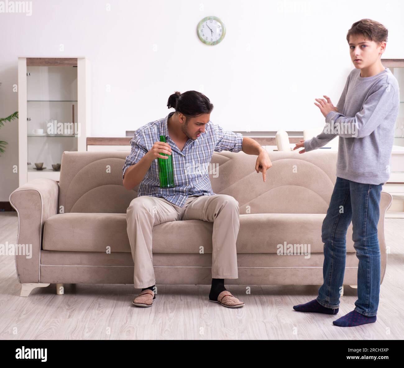 The drunk father and his son Stock Photo - Alamy