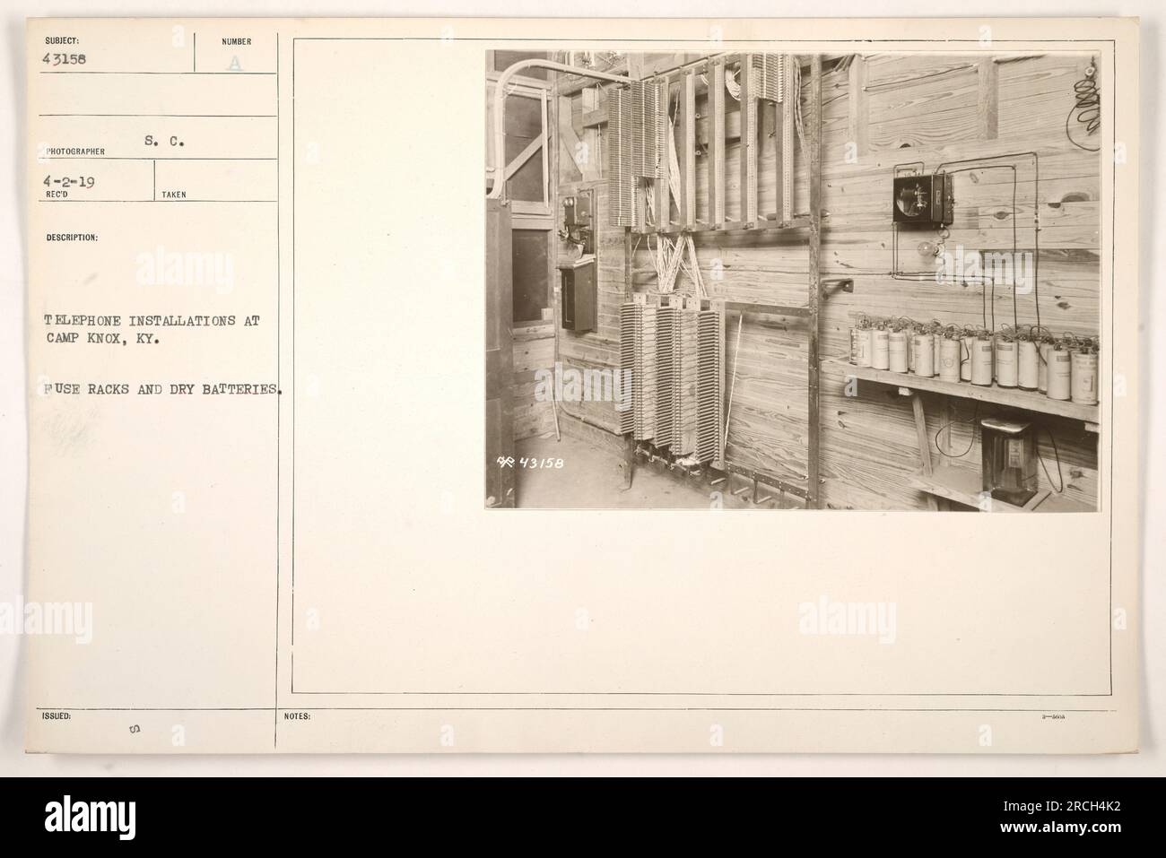 Soldiers installing telephone equipment at Camp Knox, Kentucky during ...