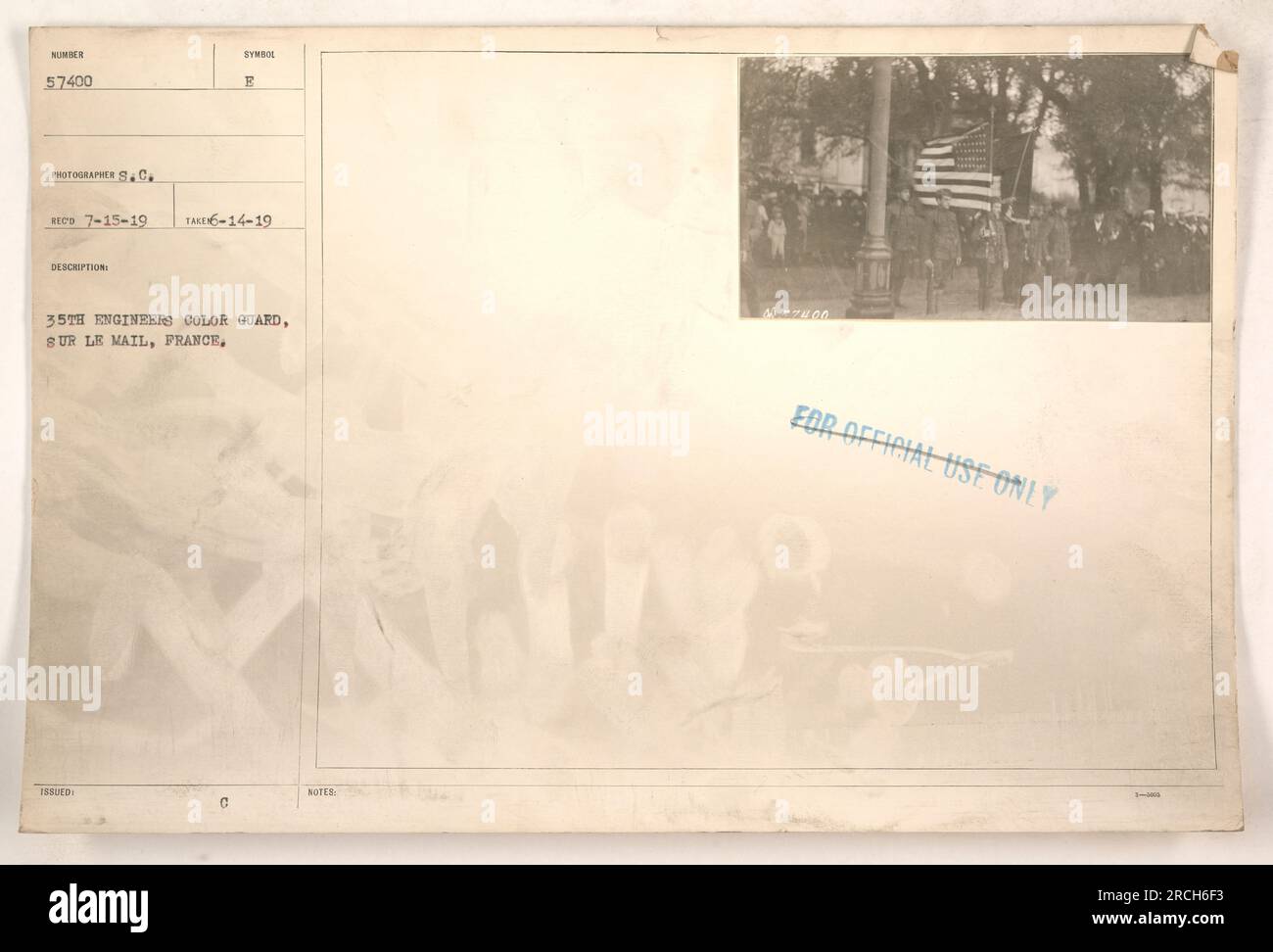 Caption: "35th Engineers Color Guard during a parade at Sur Le Mail ...