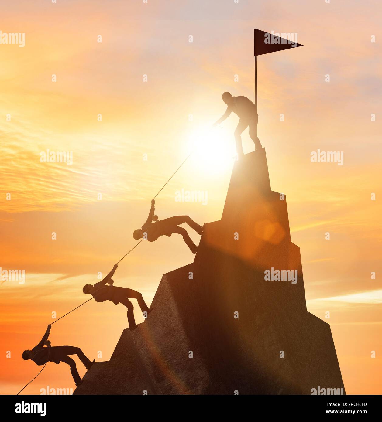 Concept of teamwork with team climbing mountain Stock Photo - Alamy