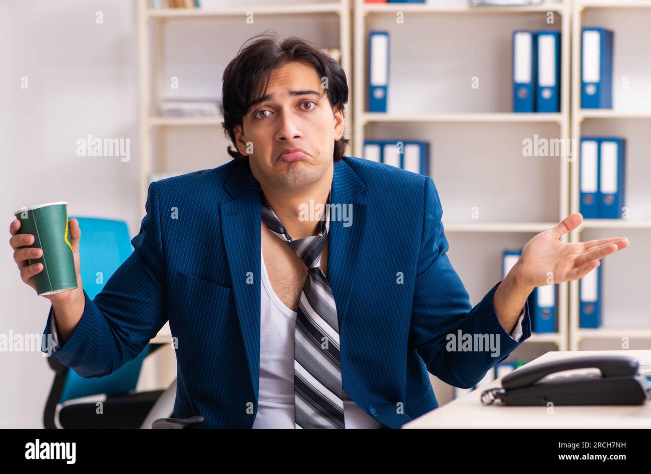 The employee coming to work straight from bed Stock Photo - Alamy