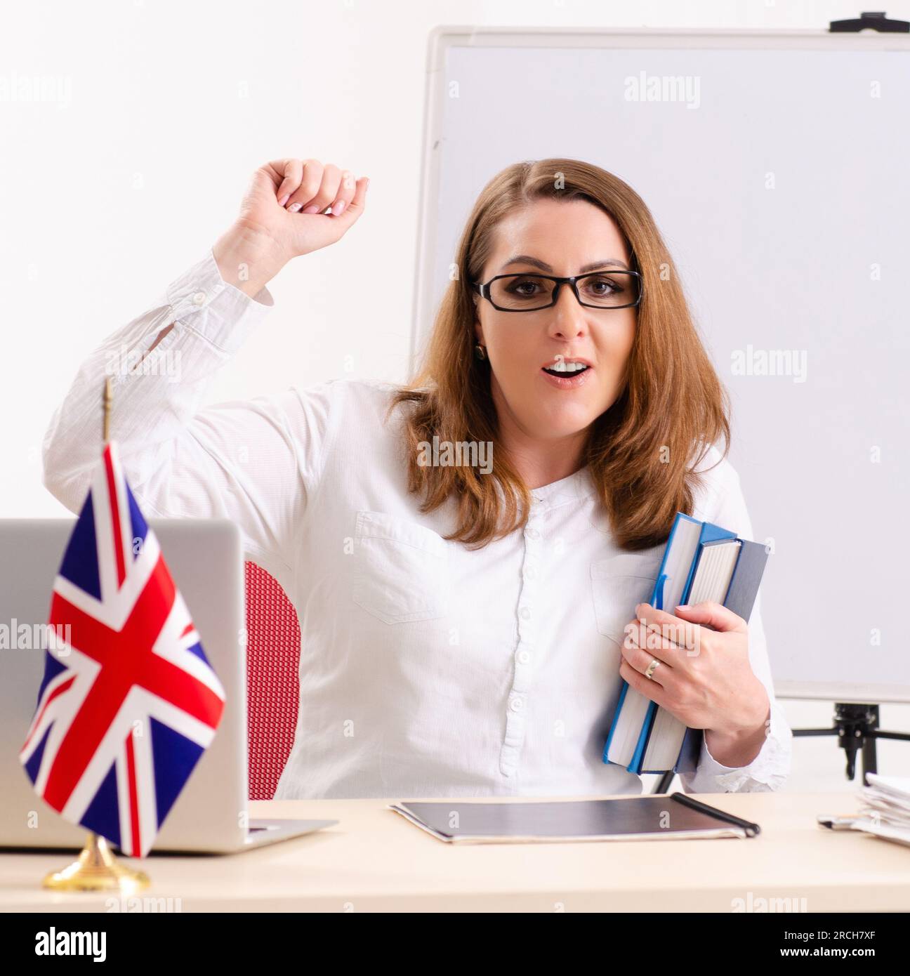 The female english language teacher in front of whiteboard Stock Photo ...