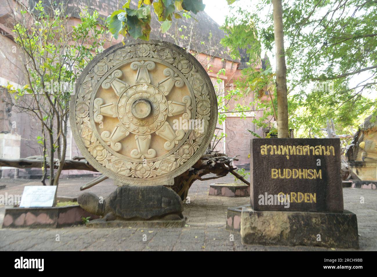 Outdoor Carved sandstone wheel of Dhamma and symbol of Buddhism ...