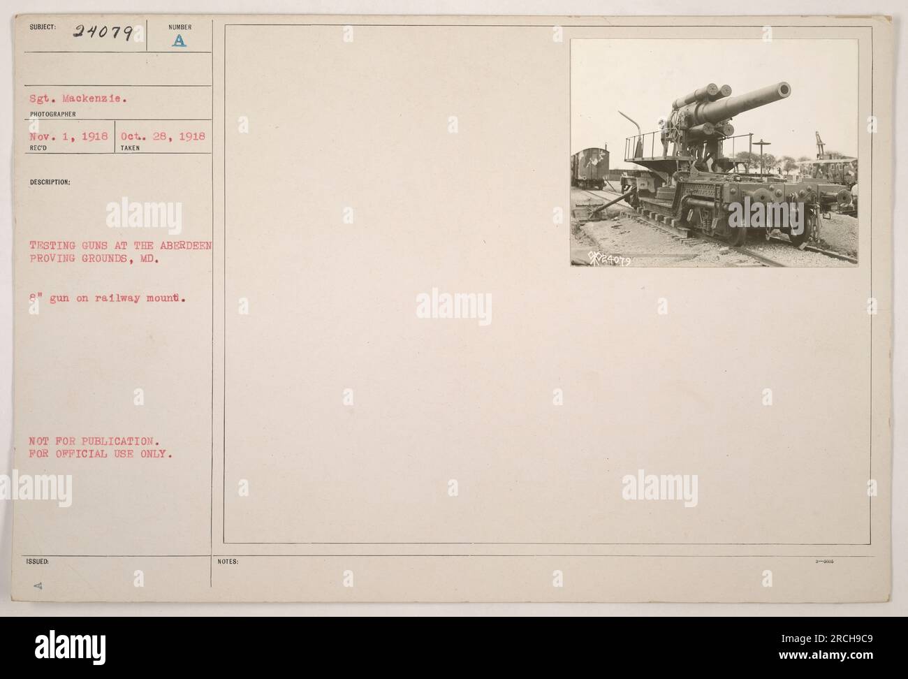 Sergeant Mackenzie testing an 8" gun on a railway mount at Aberdeen ...