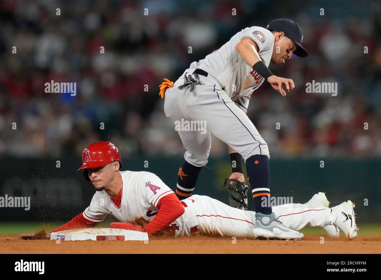 Los Angeles Angels' Andrew Velazquez, left, steals second base ahead of ...