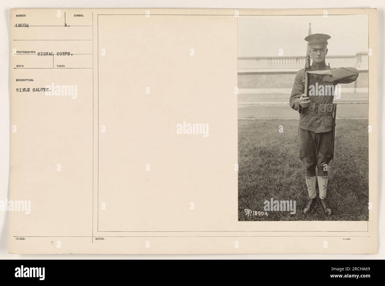 Soldiers performing a rifle salute during World War One. The image ...
